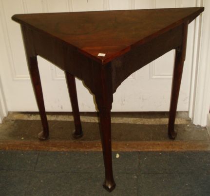 Bonhams : A mid 18th Century mahogany triangular corner table, with ...