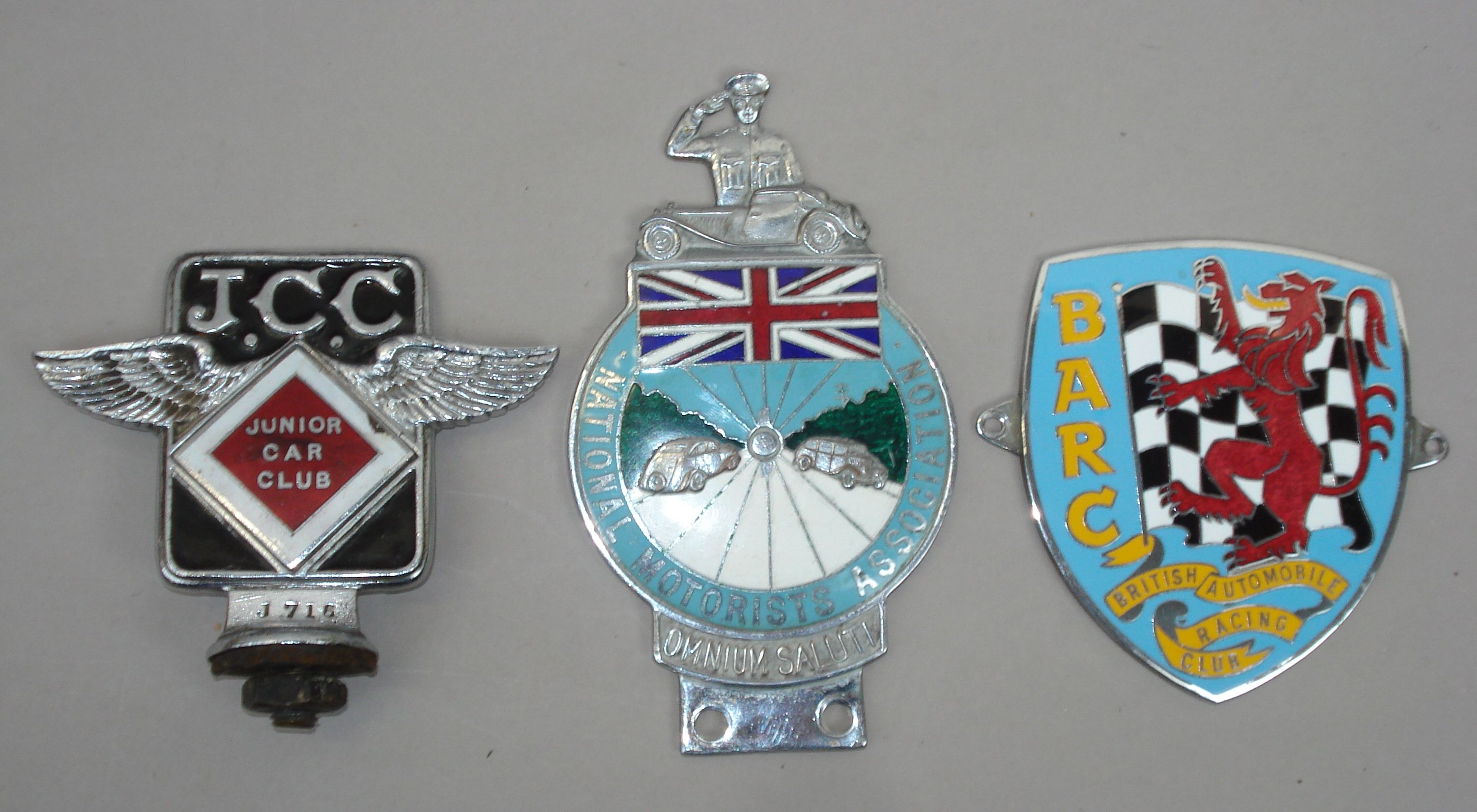 Bonhams Cars : Three motoring badges,