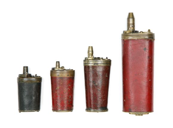 Bonhams : A Red Leather-Covered Three-Way Powder-Flask For Flintlock ...