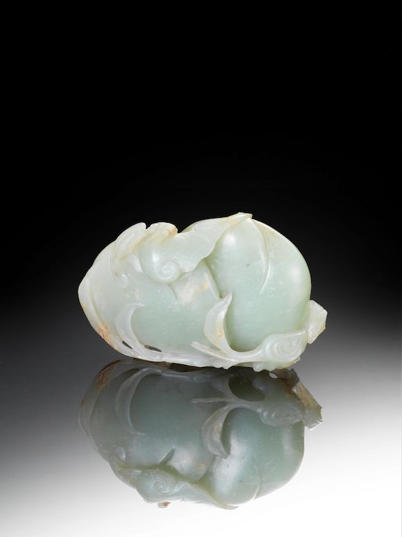 Bonhams : A celadon jade group of two peaches 18th century