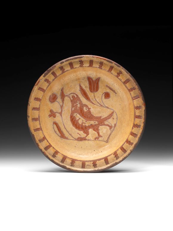 Bonhams : A West Country slipware dish, first half 18th century