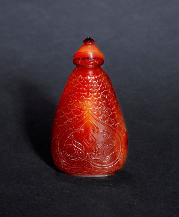 Bonhams : A mottled orange agate, Chinese snuff bottle; with stopper