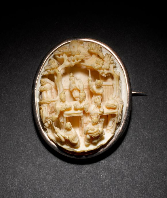 Bonhams : A gold-metal mounted Cantonese ivory brooch, decorated with ...