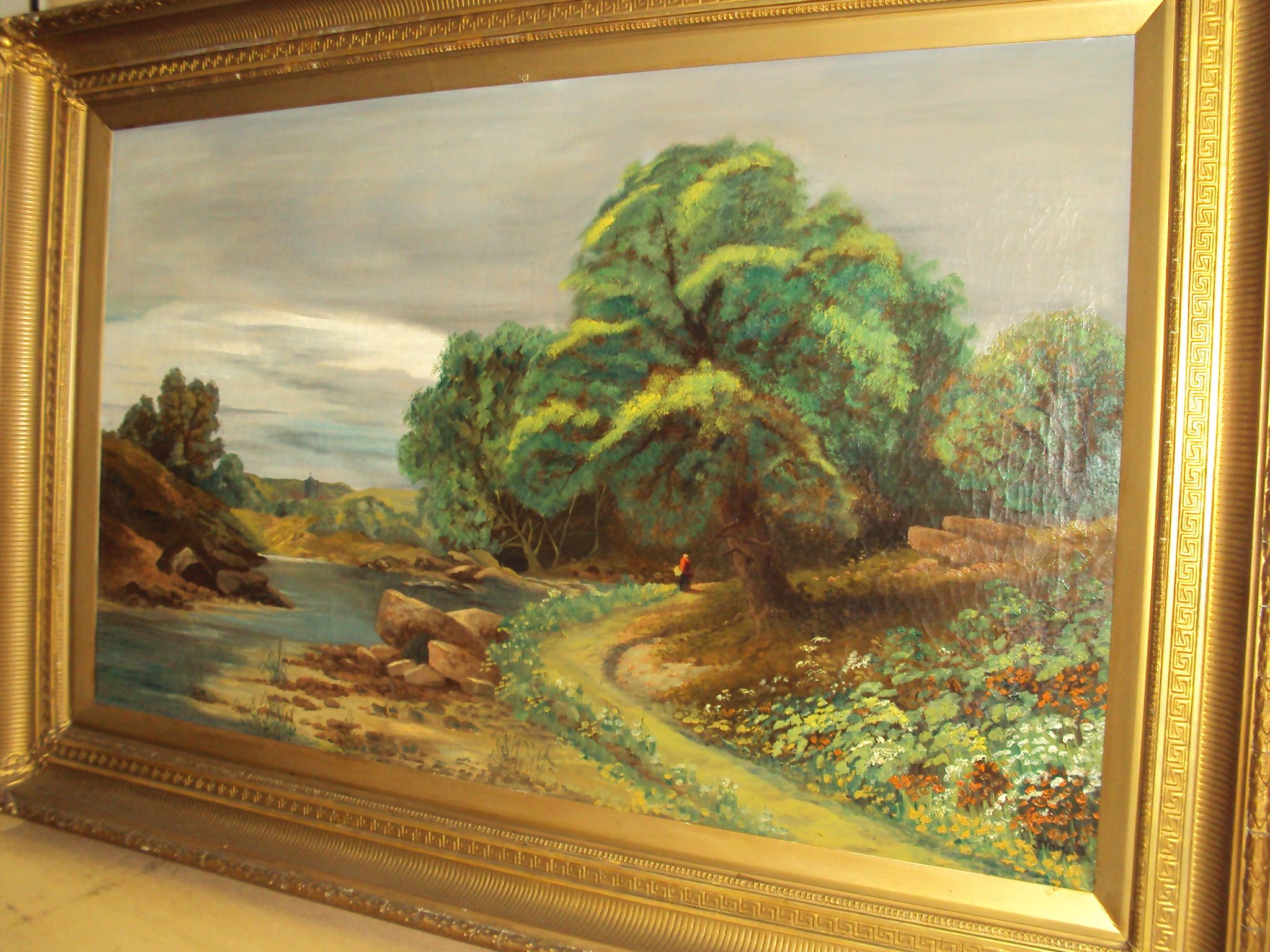 Bonhams : British School (19th century) River landscape with lady on a wooded path and a church ...