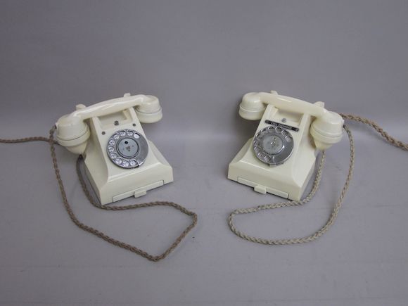 Bonhams : Two type 312 ivory bakelite telephones: impressed marks: E-37 and 164 54,