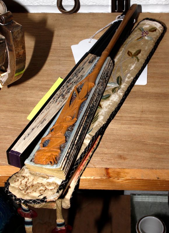 Bonhams : A Cantonese black ground fan,decorated with a river landscape ...