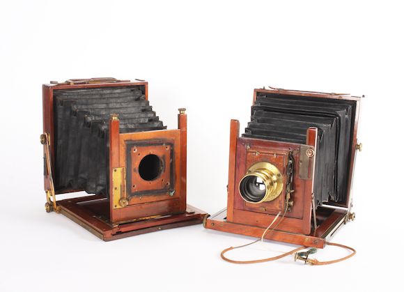 Bonhams : Mahogany and brass half plate field cameras