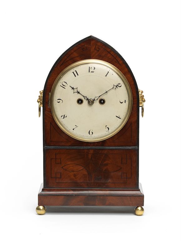 Bonhams : An early 19th century inlaid mahogany lancet shaped bracket ...