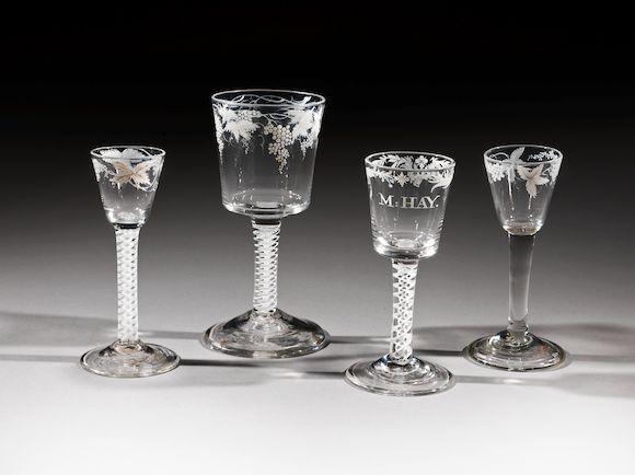 Bonhams : A Beilby enamelled opaque-twist wine glass, circa 1765