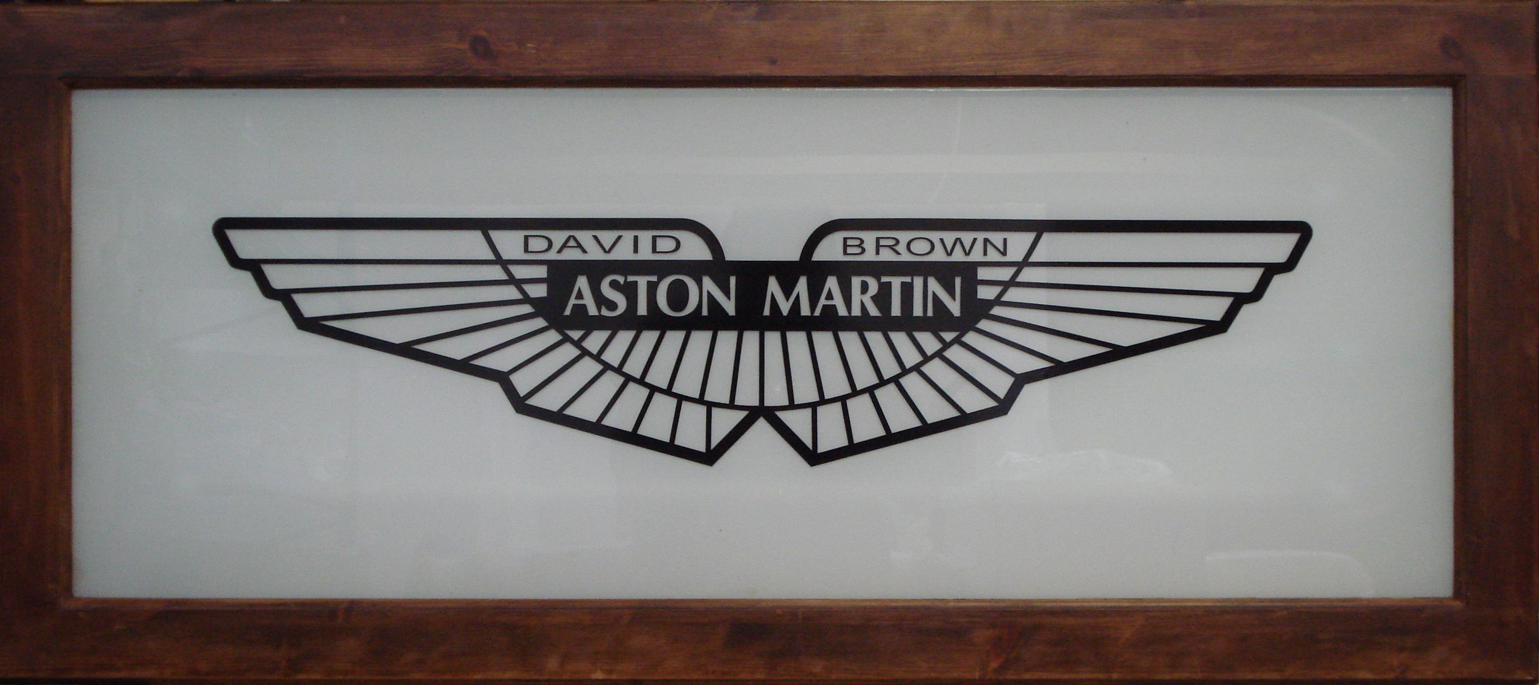 Bonhams Cars : A David Brown Aston Martin illuminating glass sign,