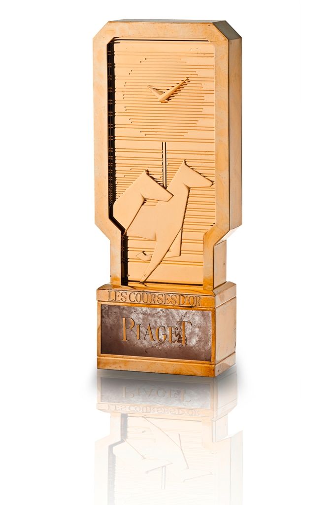 Bonhams : Piaget. A fine and very rare silver gilt prize with clock ...