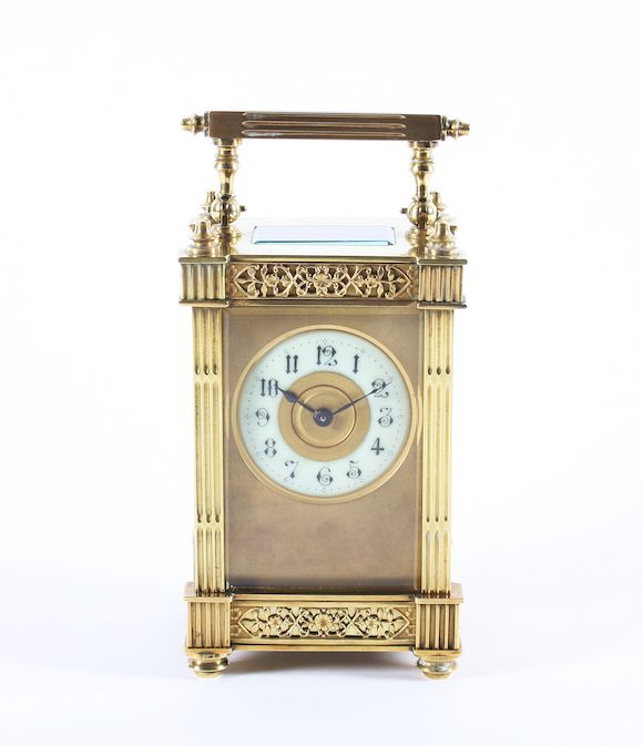 Bonhams : A carriage timepiece in a decorative brass and bevel glass ...