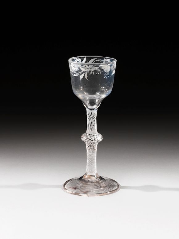 Bonhams : A Beilby opaque-twist wine glass, circa 1765