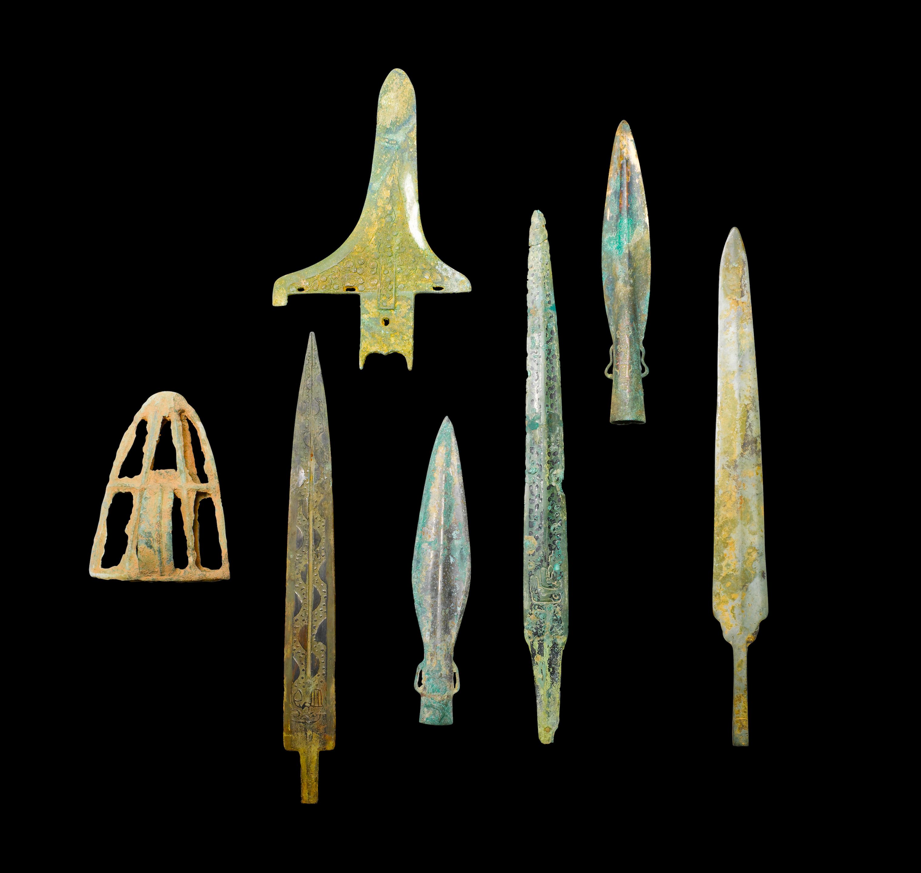 Bonhams : Seven bronze jian, dagger axes and spear heads Late Eastern ...