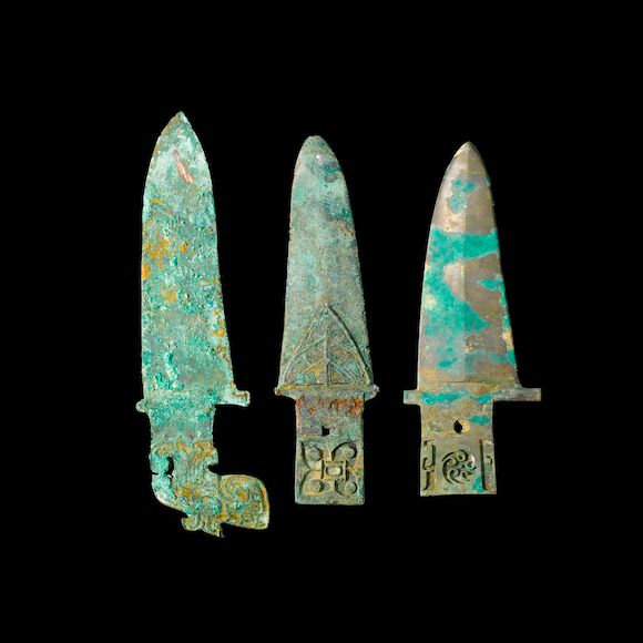 Bonhams : Three bronze dagger axes Shang dynasty