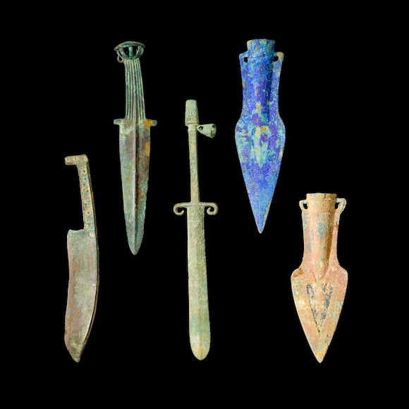 Bonhams : Two spear heads and three bronze utility knives Shang dynasty ...