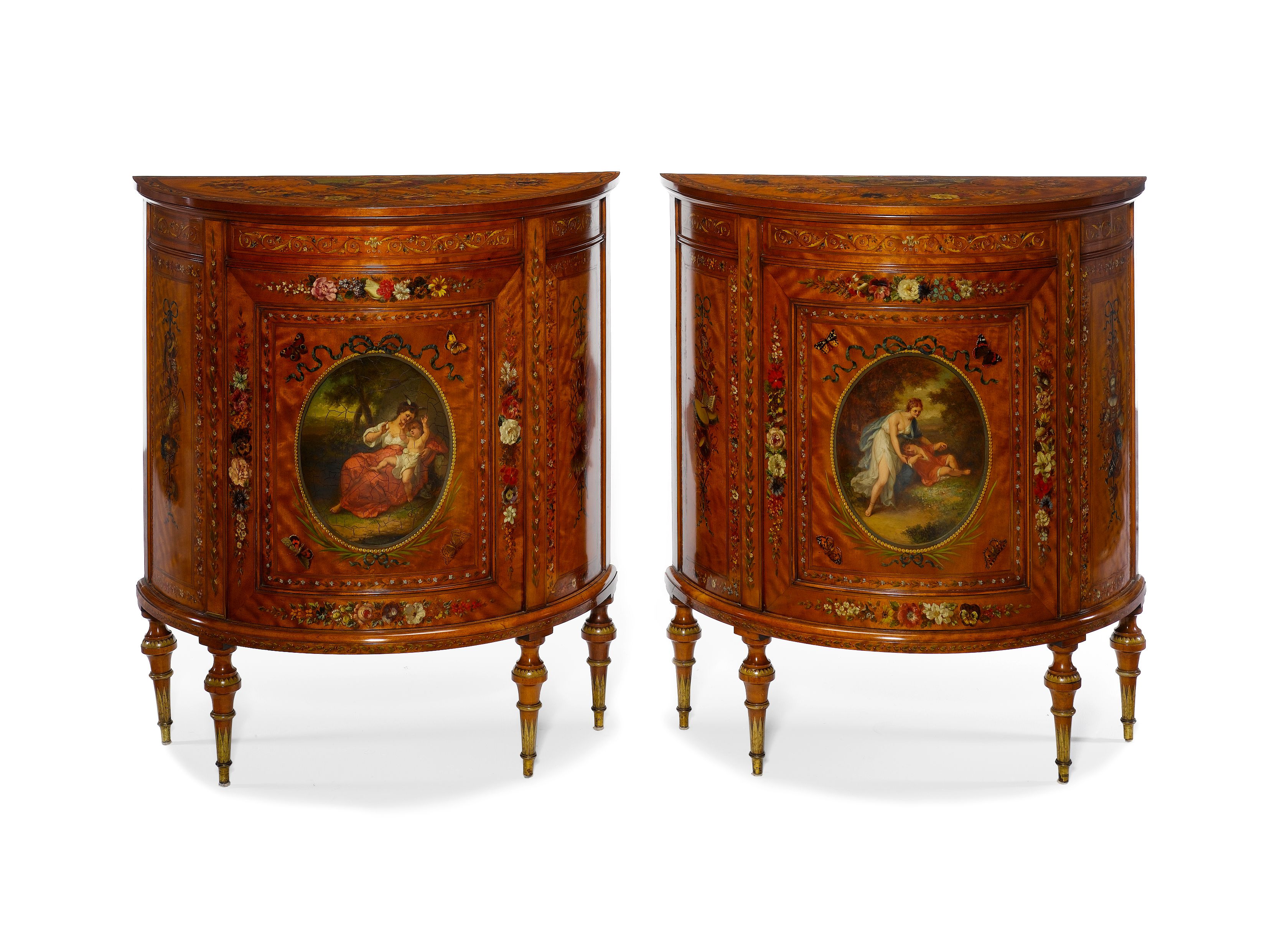 Bonhams : A fine pair of Victorian satinwood painted demi-line side cabinets in the manner of ...