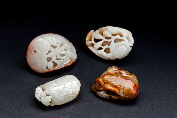 Bonhams : Four white and russet jade 'animal and insect' groups Mid ...