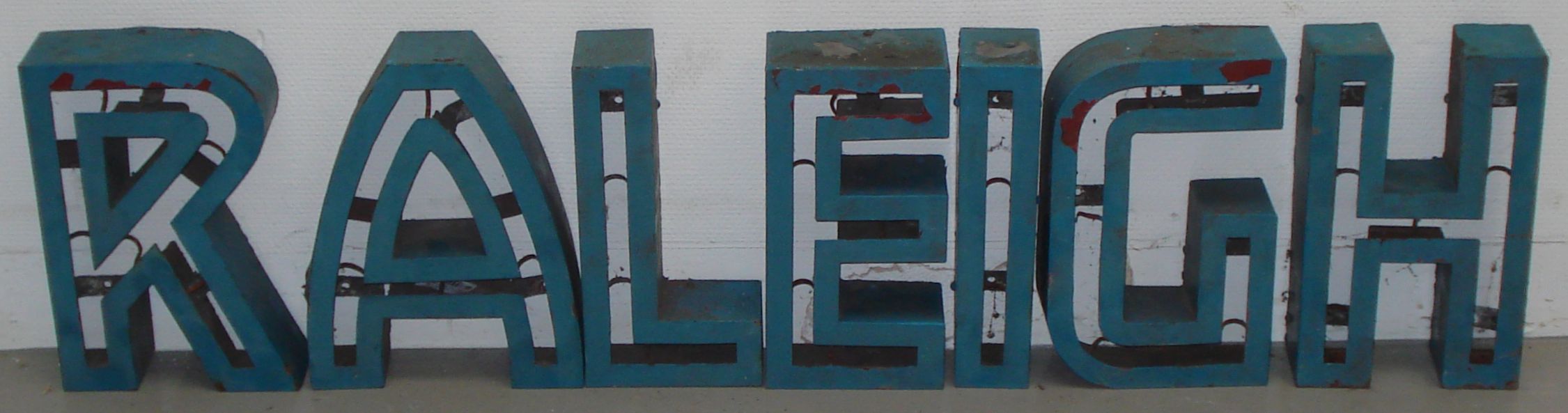 Bonhams Cars : 'RALEIGH', a set of metal letters from an advertising ...