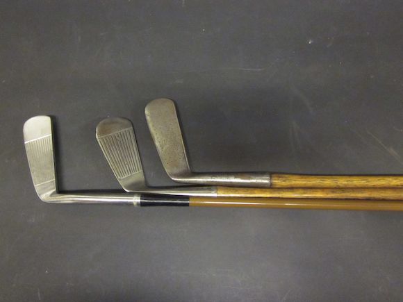 Bonhams : A pair of wooden shafted putters