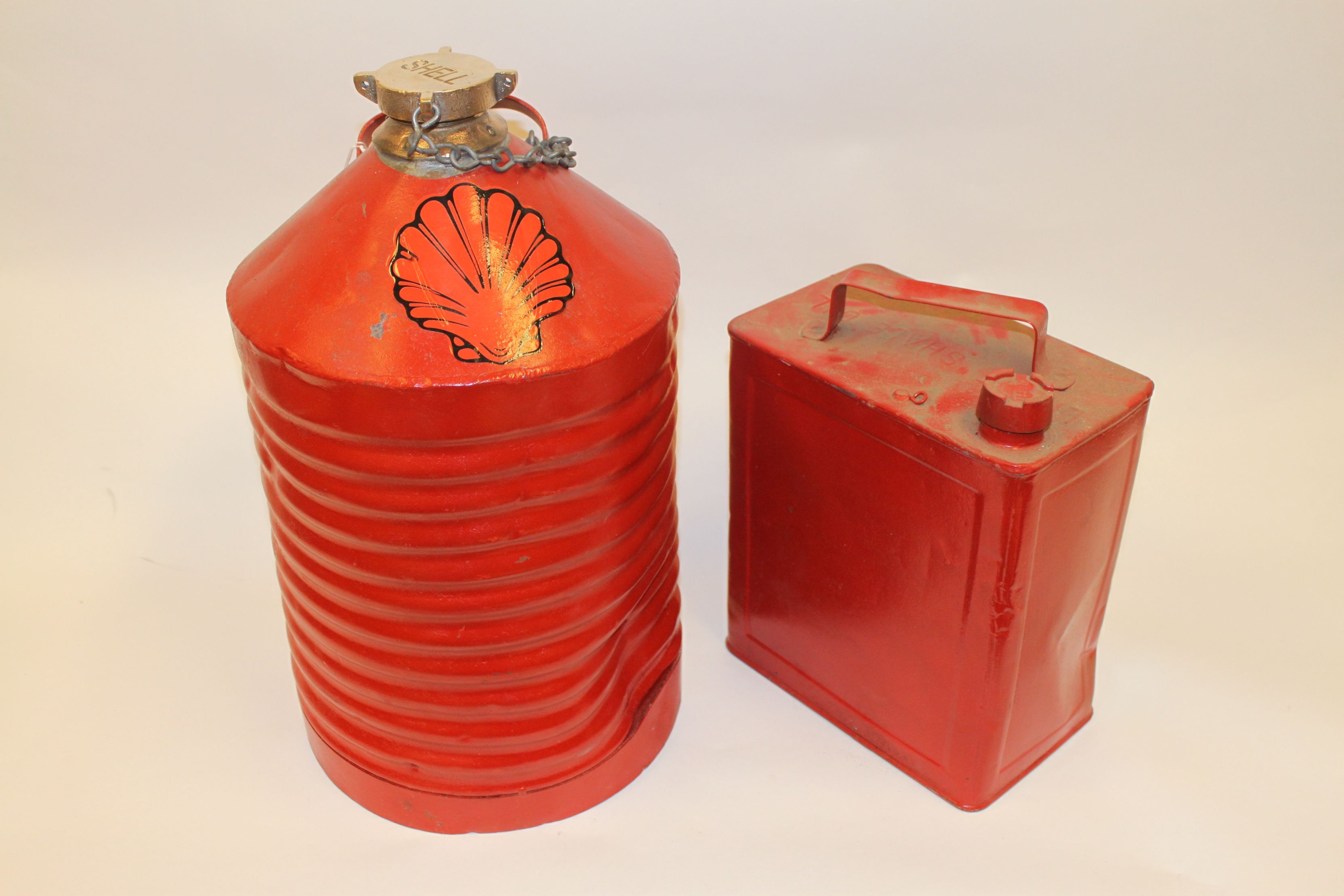 Bonhams Cars : A red Light Shale oil can together with a large 1920's ...