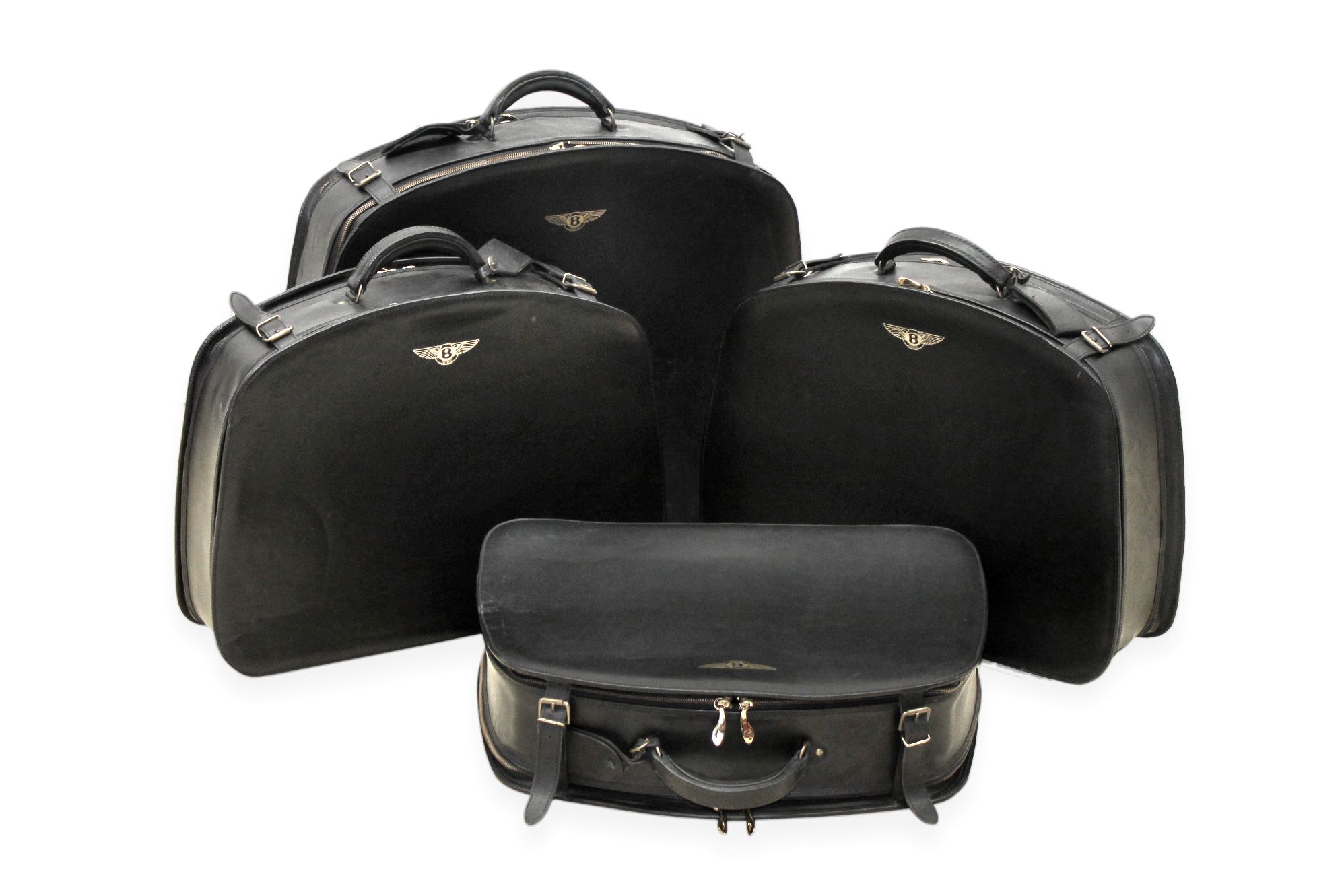 Bonhams Cars : A four piece Bentley Swaine Adeney Brigg leather luggage set