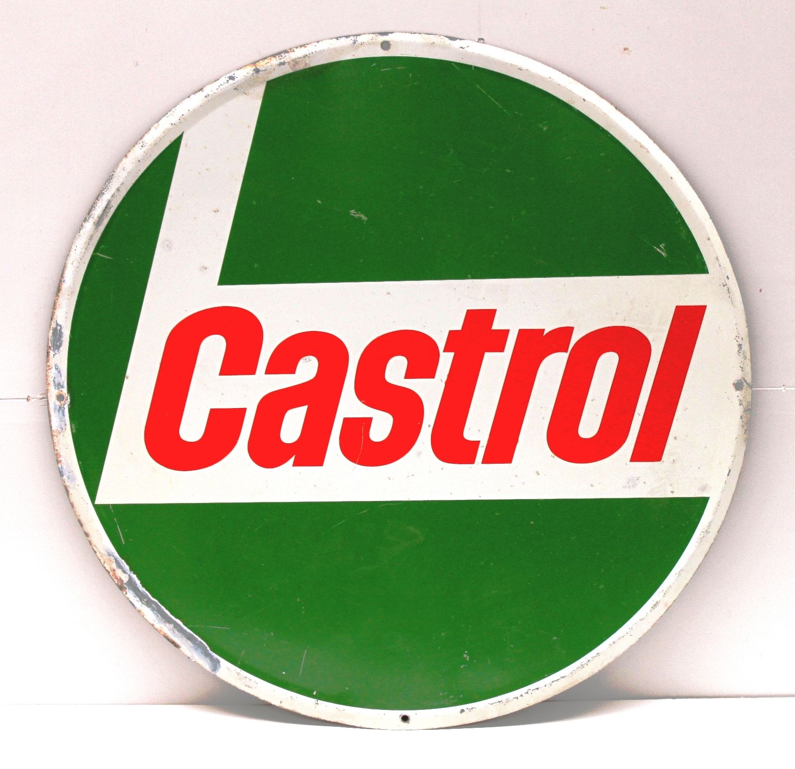 Bonhams Cars : A round Castrol sign 60cm diameter