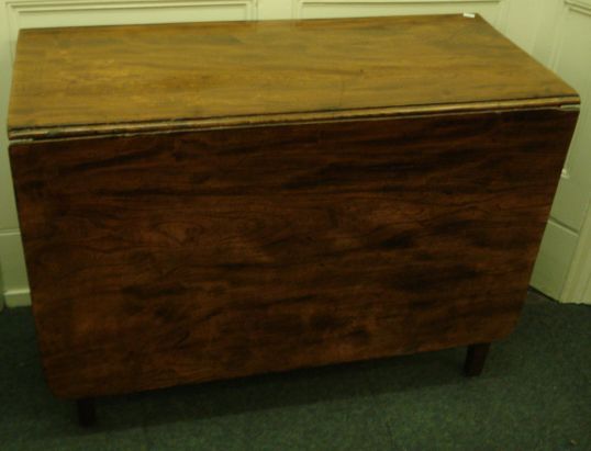 Bonhams : A George III elm drop leaf dining table, of good colour, on ...