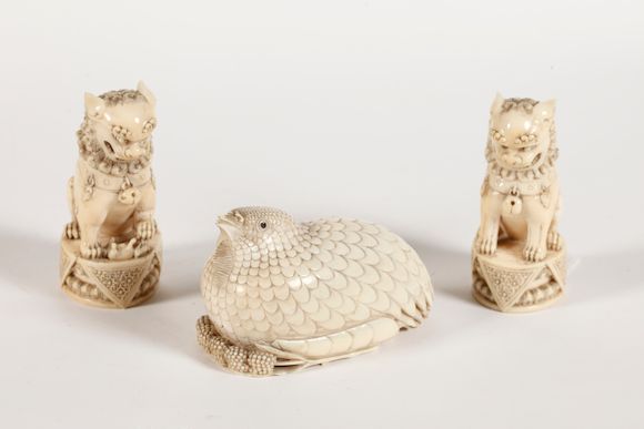 Bonhams : A pair of Chinese carved ivory temple dogs