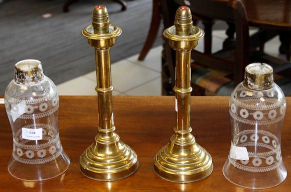 Bonhams : A pair of late Victorian brass, patent, spring loaded candle ...