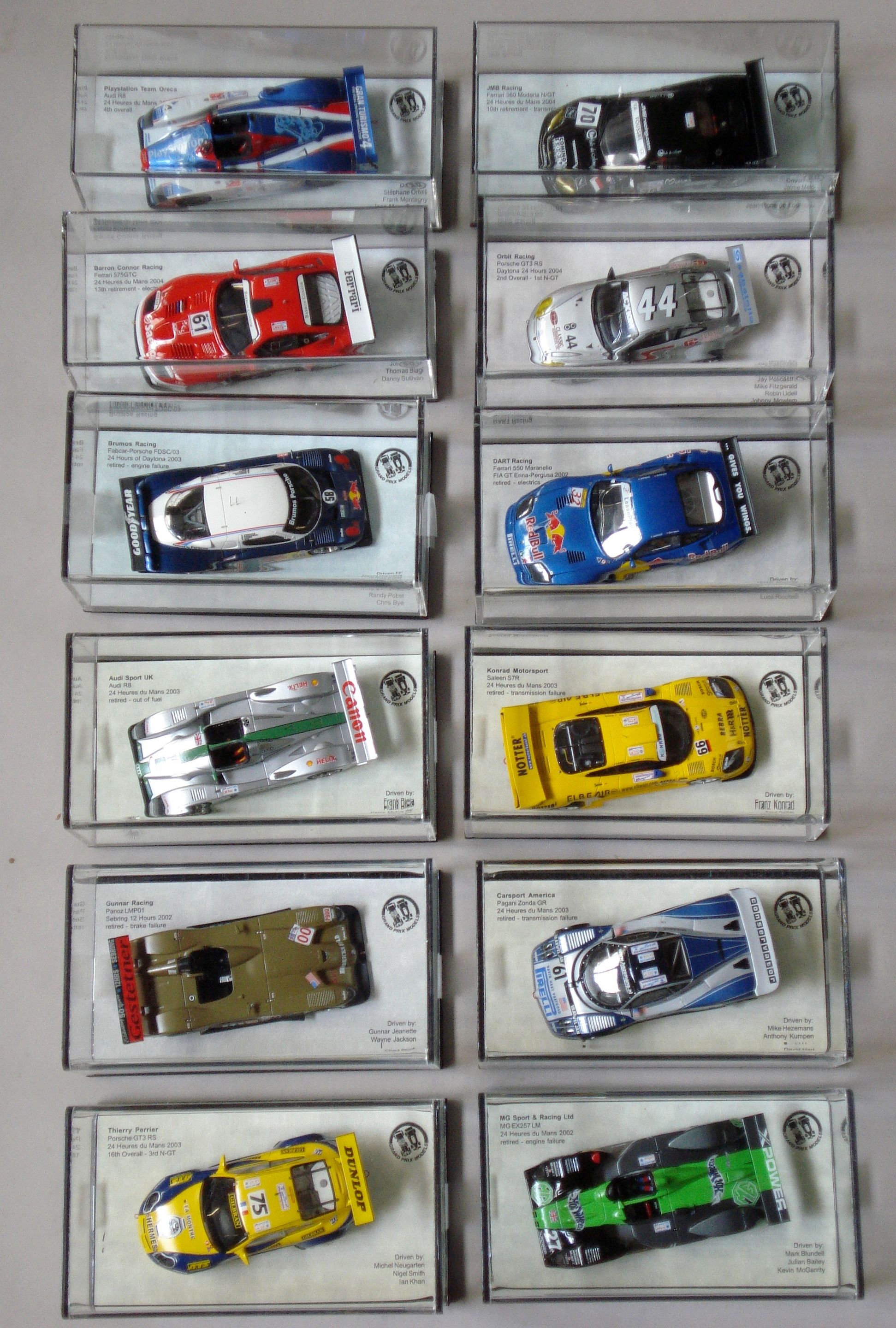 Bonhams Cars : A collection of twelve white metal models mounted ...