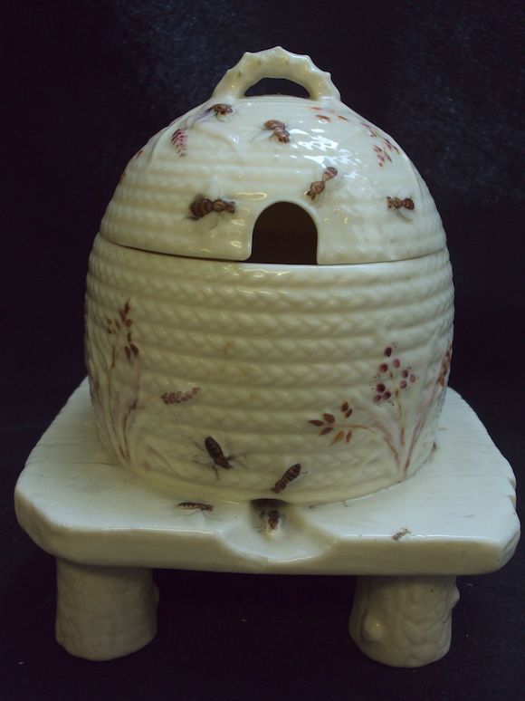Bonhams : A Belleek first period beehive honeypot