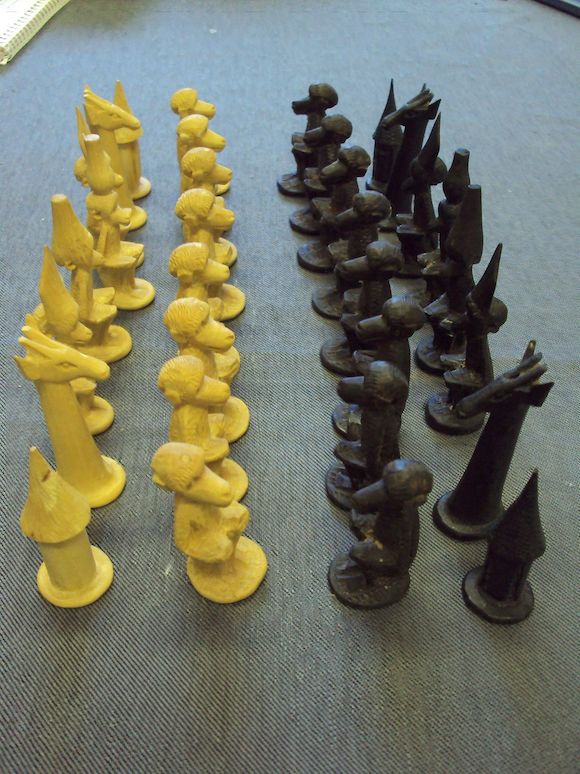 Bonhams : A 20th century Nigerian carved chess set
