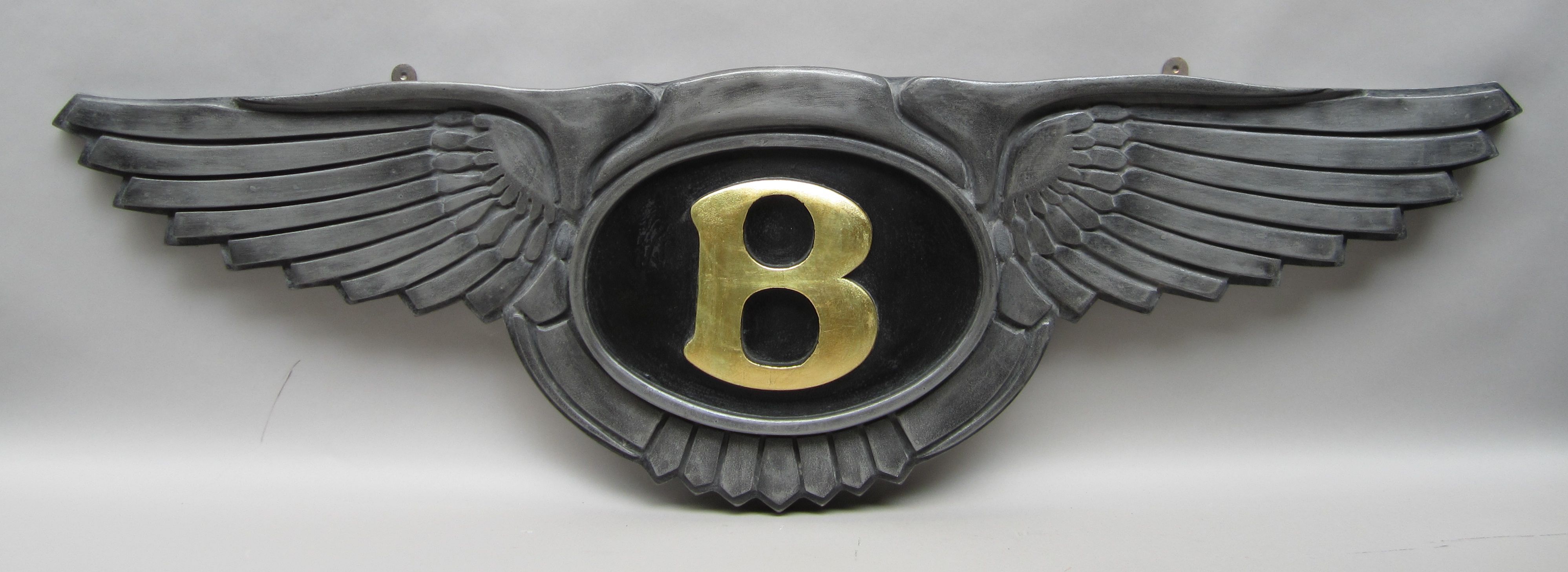 Bonhams Cars : A cold-cast aluminium Bentley badge,