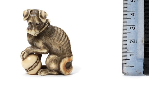 Bonhams : A fine ivory netsuke of a dog By Okatomo, Kyoto, early 19th ...