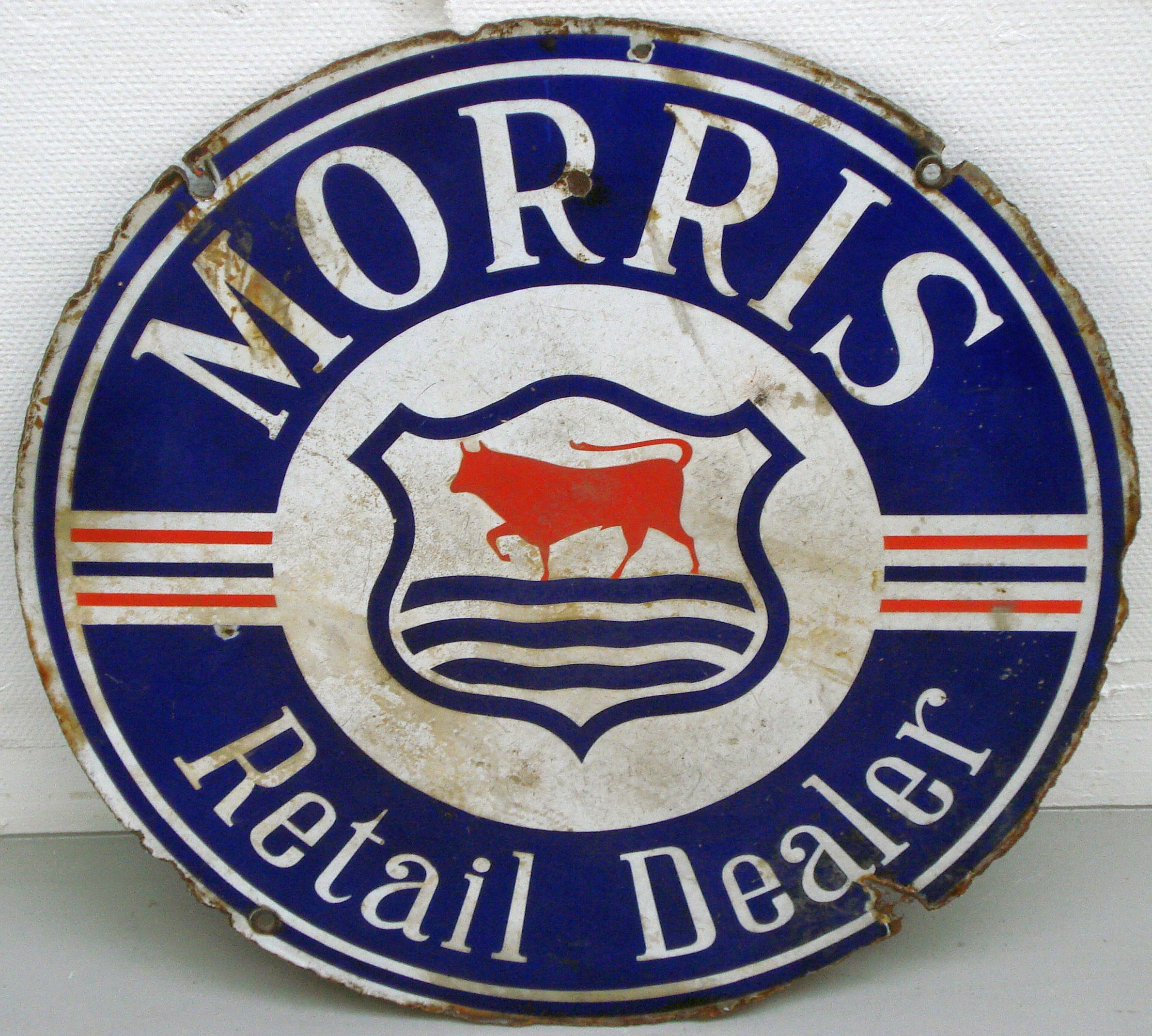 Bonhams Cars : A Morris Retail Dealer, double-sided, circular enamel sign,