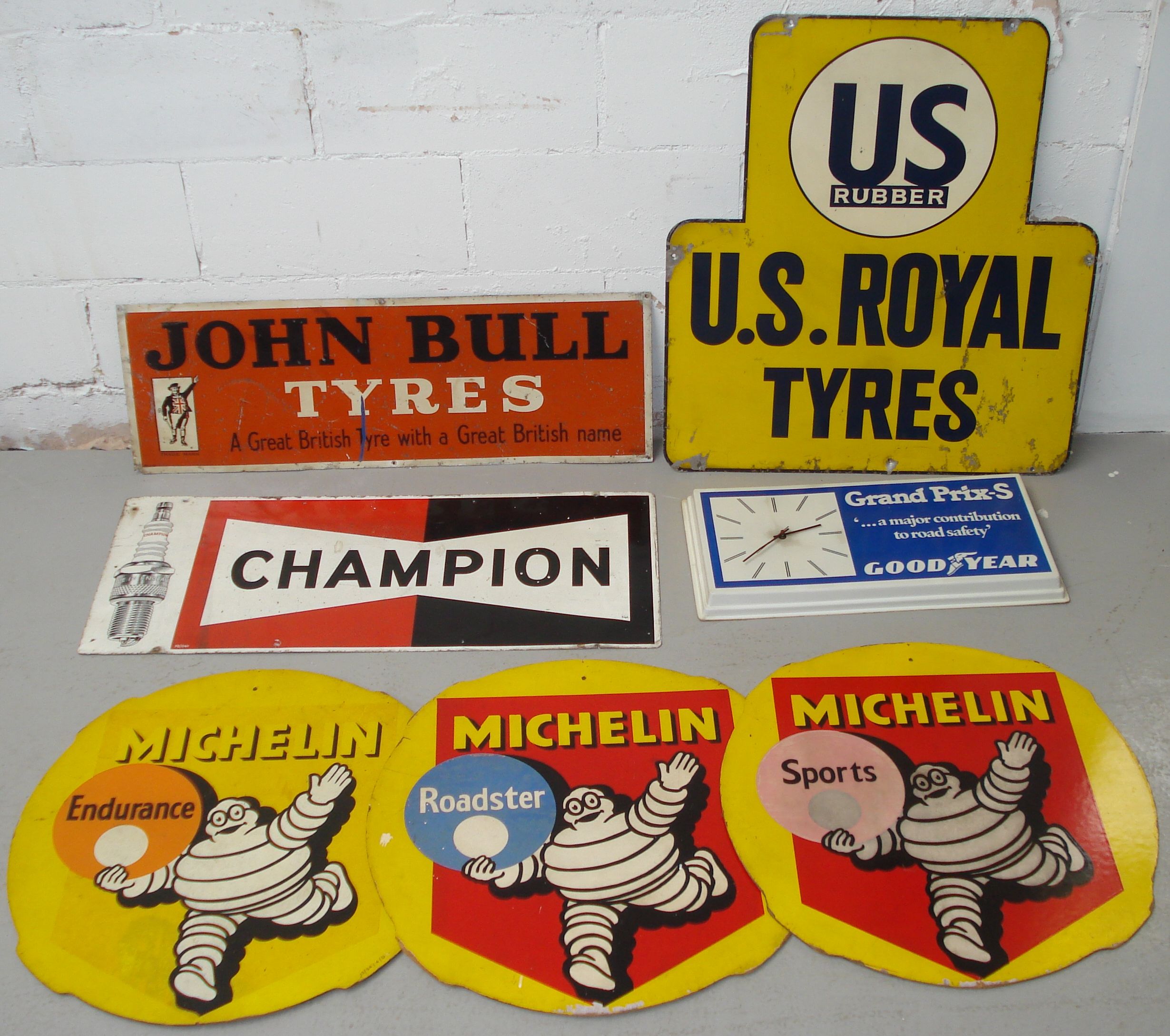 Bonhams Cars : Assorted tyre advertising signs,