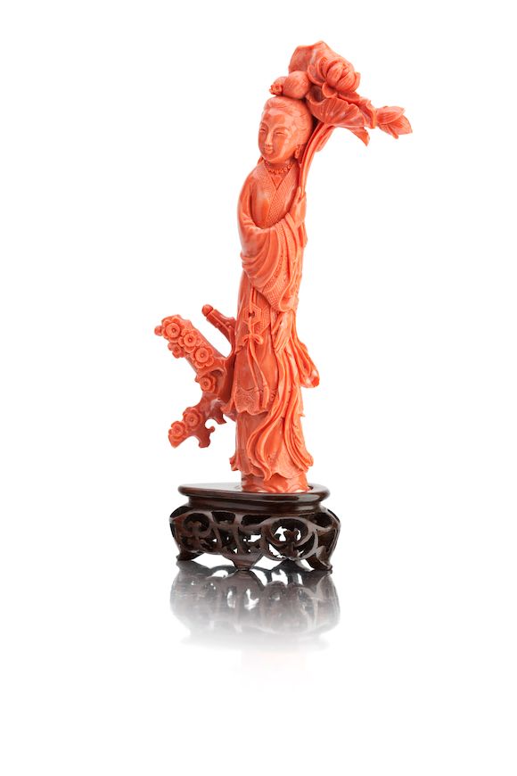 Bonhams : A carved red coral figure of a lady