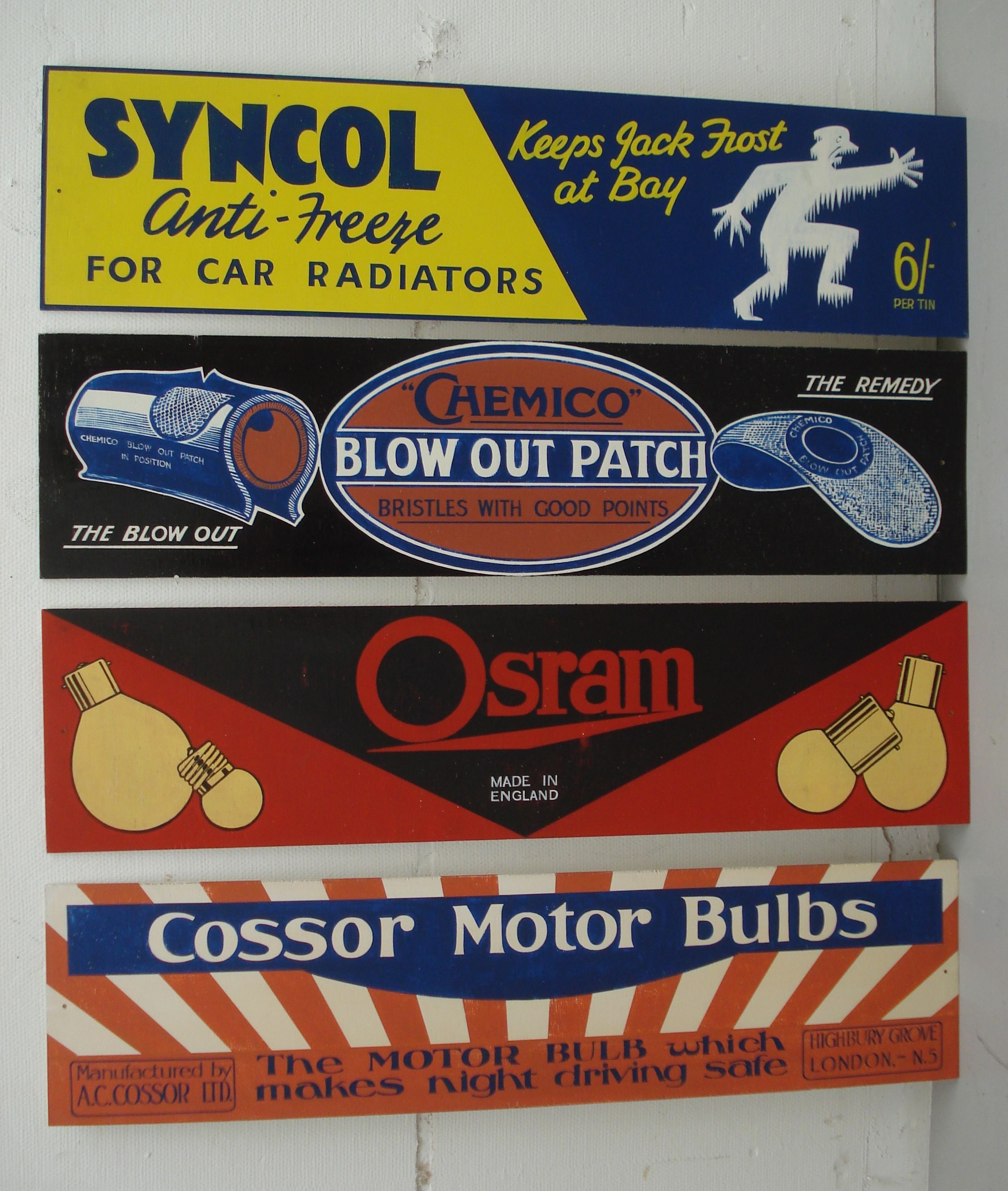 Bonhams Cars : A collection of wooden advertising signs,