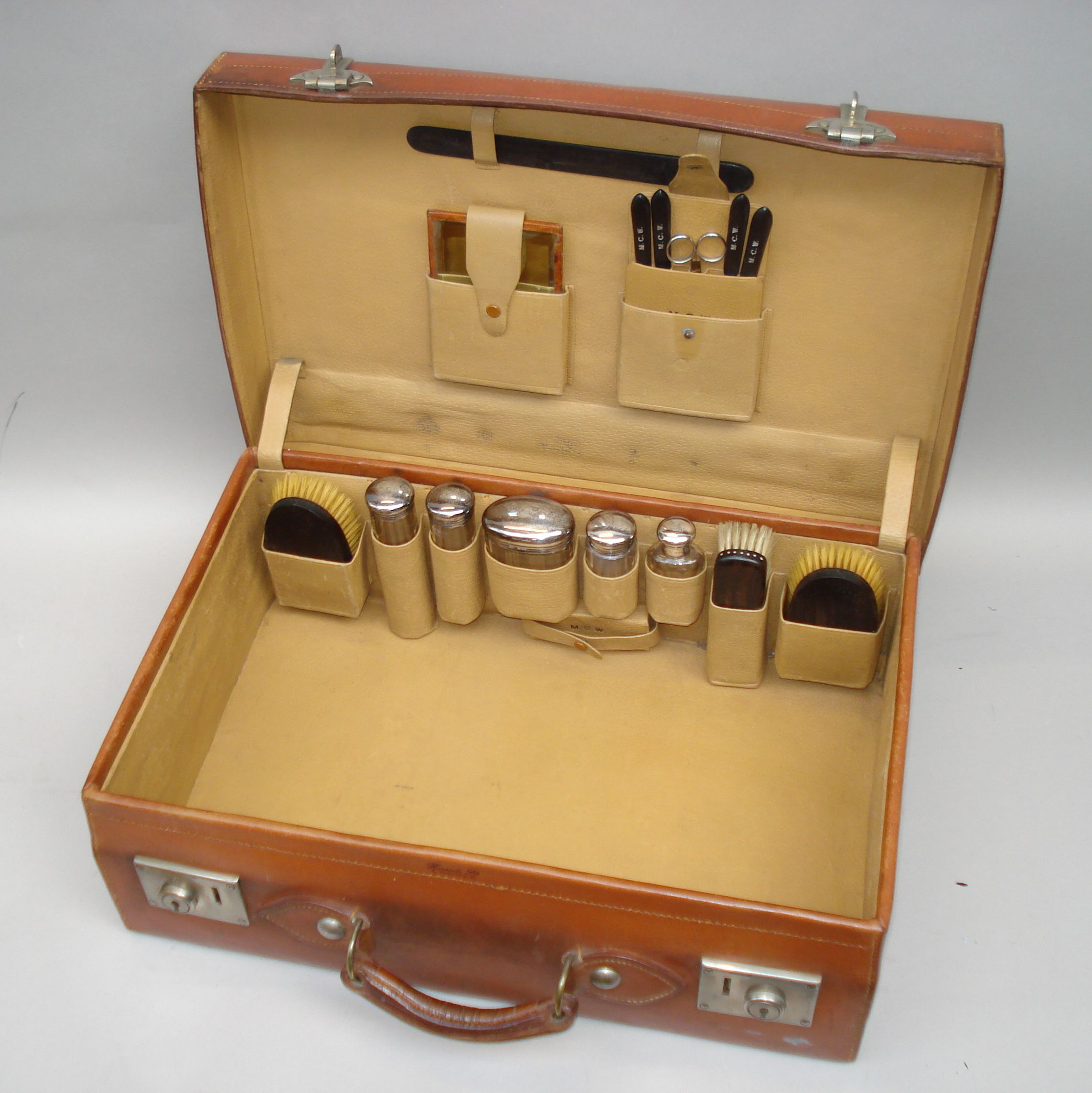 Bonhams Cars : A leather-cased gentleman's vanity set, distributed by ...