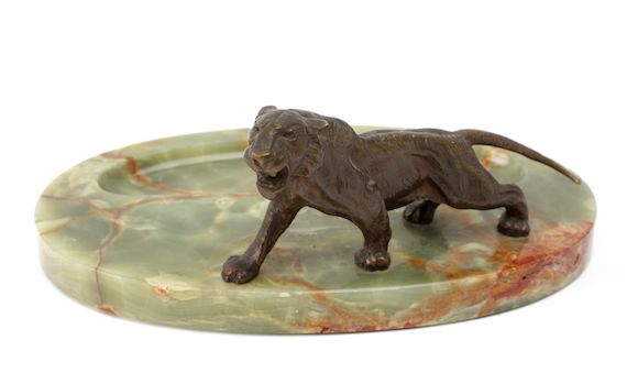 Bonhams : An early 20th century oval onyx ashtray with bronze figure of ...