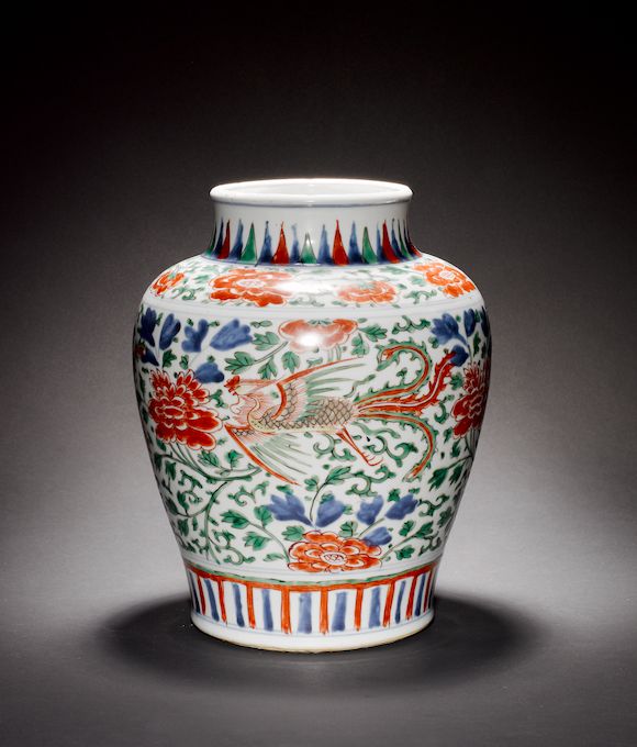 Bonhams : A Transitional wucai oviform vase, decorated with long-tailed ...