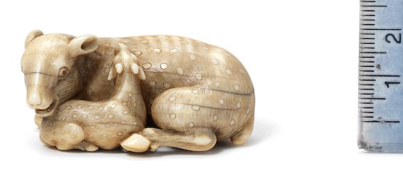 Bonhams : An ivory netsuke of a doe and young By Okatomo, Kyoto, 19th ...