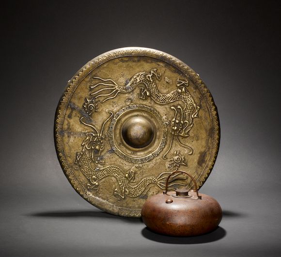 Bonhams : A metal gong of circular form, decorated with dragons ...