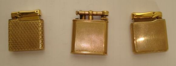 Bonhams : A Dunhill lighter, in rectangular engine turned 9ct gold case ...