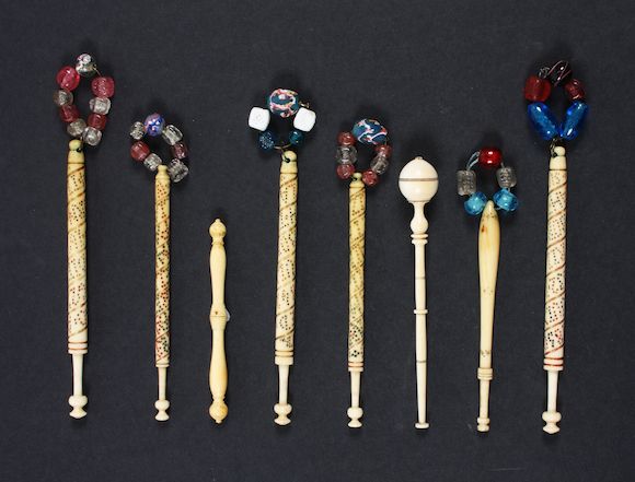 Bonhams : Seven bobbins and a parchment pricker