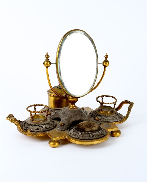 Bonhams : A gilt metal dressing table set