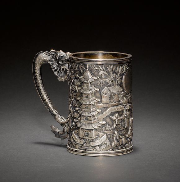 Bonhams : A Chinese white metal tankard with dragon handle, decorated ...