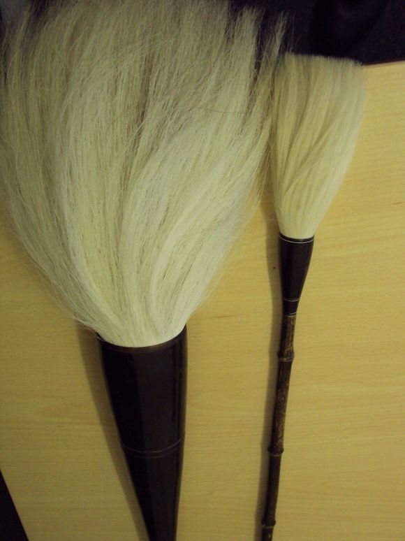 Bonhams : Two horn fly whisks