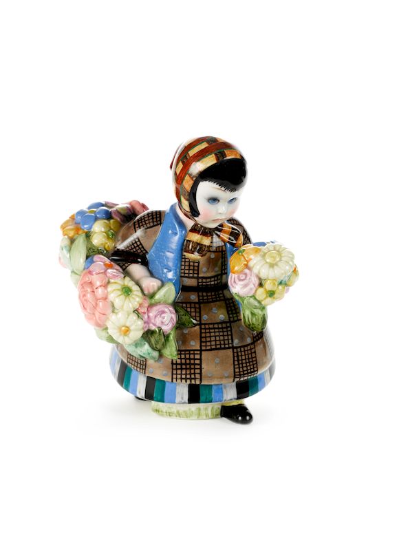 Bonhams : Lenci A Polychrome Pottery Figure of a Girl with Baskets of ...